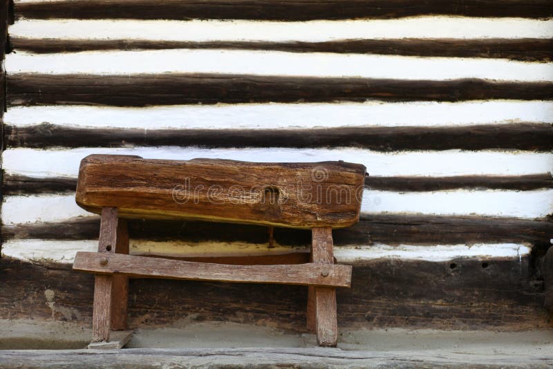 Wooden rustic small bench stock photo. Image of wall - 70198864