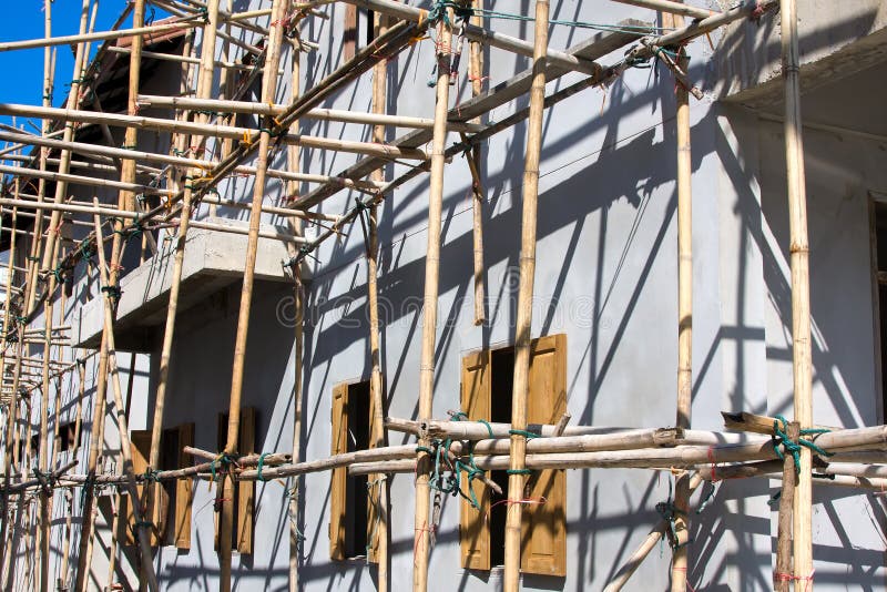 Wooden Scaffolding Near the Old Building and Tree Branches Stock Image ...