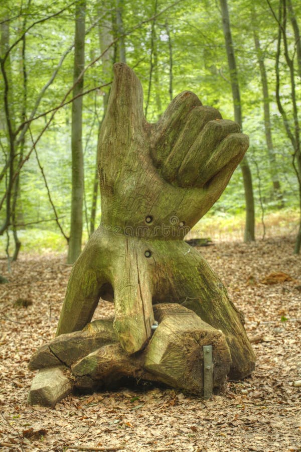 Wooden Sculpture of a Hand a Wood Stock Photo - Image of syke, trees ...