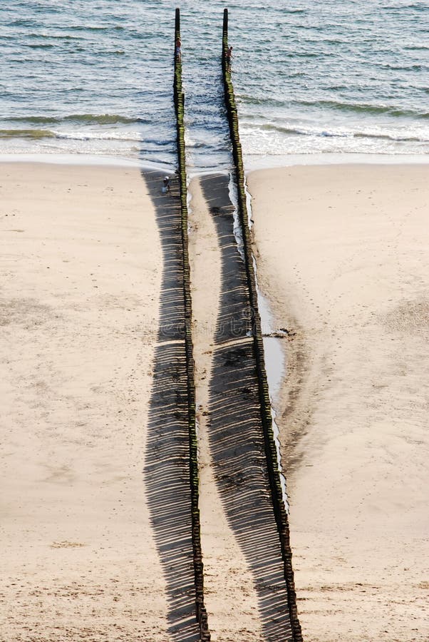 Wooden sea breakers stock image. Image of pole, tide - 12074461