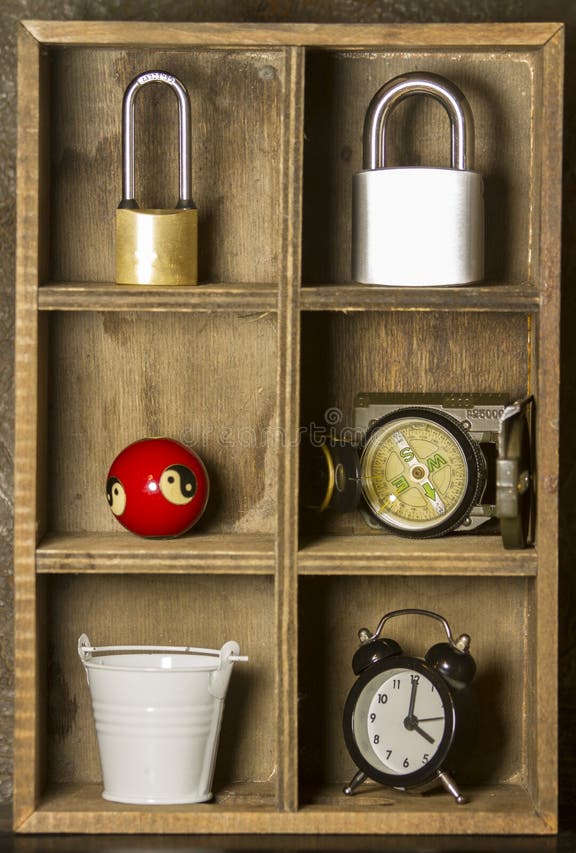 Wooden Shelf and Clock, Lock, Compass, Bucket Stock Photo - Image of ...