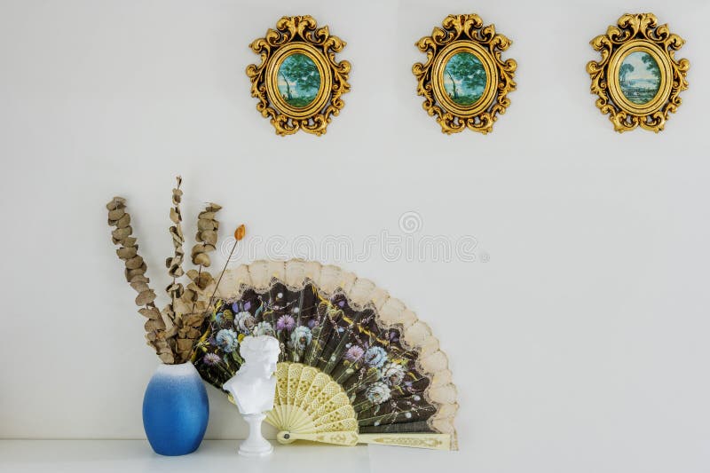 Wooden Shelf with Decorative Objects with Gilded Wood Frames, Vases ...