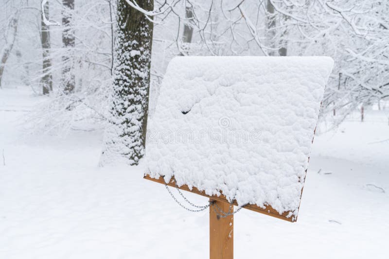 Wooden Sign Board in the Snowy Park Stock Photo - Image of signboard ...