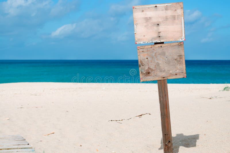 Wooden sign at the beach stock photo. Image of sign, board - 30027568