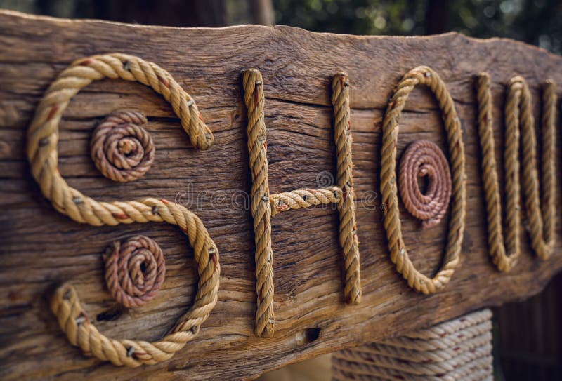 A Wooden Sign Show Made with Rope Letters Stock Photo - Image of ...