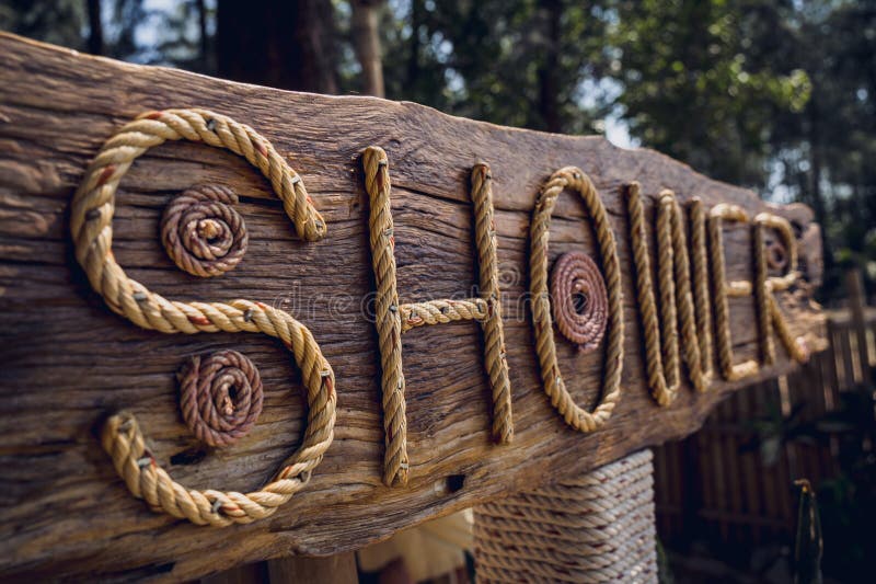A Wooden Sign Show Made with Rope Letters Stock Photo - Image of ...