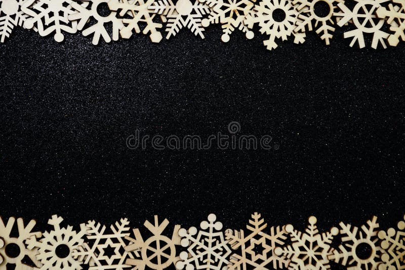 Wooden Snowflake Border Frame on Black Glitter Background Stock Photo ...