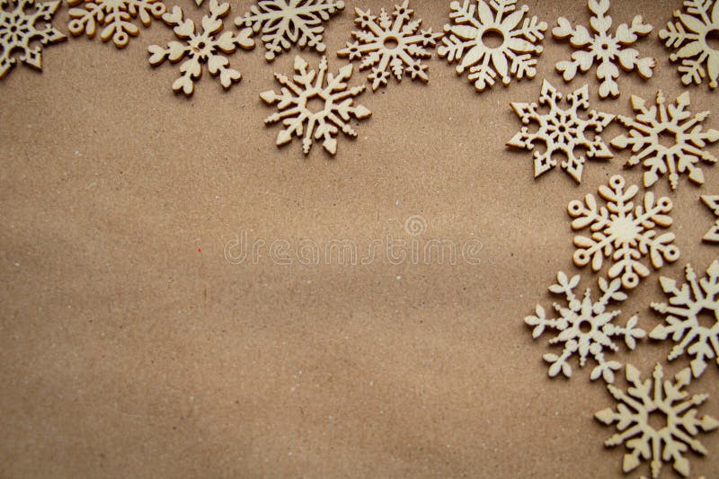 Wooden Snowflakes on Craft Paper Stock Photo - Image of retro, idea ...