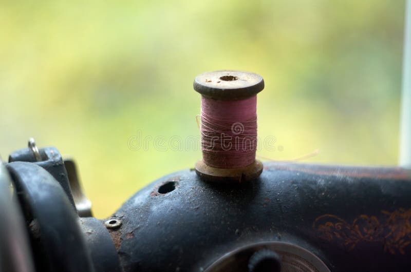 Wooden Spool with Thread on a Sewing Machine Stock Image - Image of ...