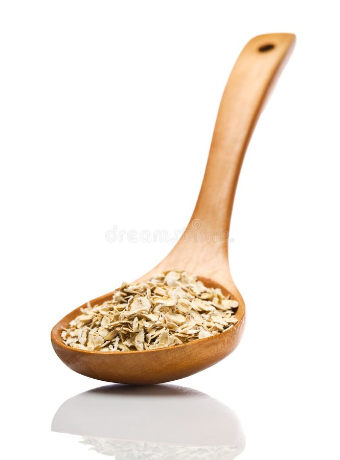 Wooden spoon with cereals stock image. Image of processed - 17364525