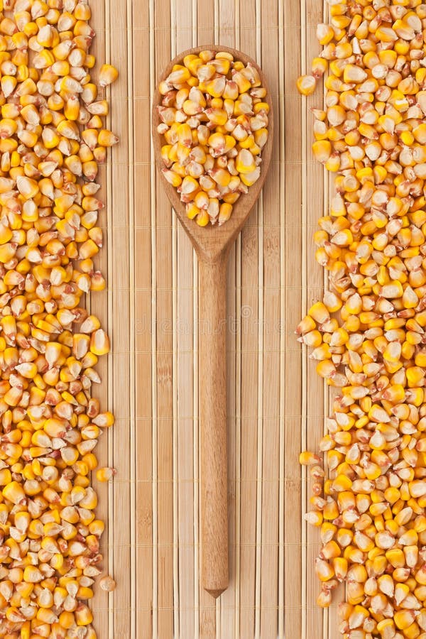 Wooden Spoon with Corn Lying Stock Photo - Image of horizontal, macro ...