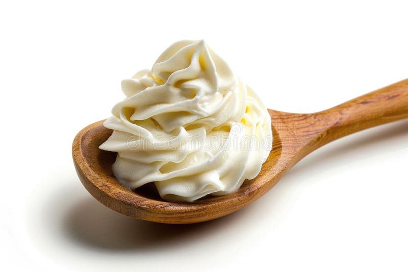 A Wooden Spoon Filled with Whipped Cream on a White Surface Stock Photo ...