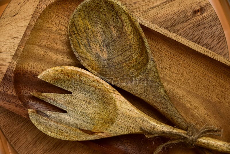 Wooden Spoon and Fork on Table Wooden Spoons on a Wooden Board Stock ...