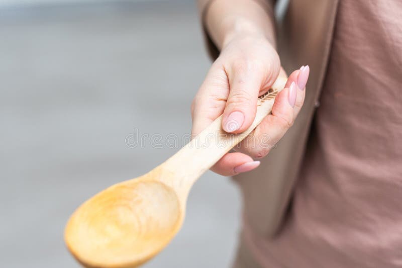 Wooden Spoon in Hand Isolate Stock Photo - Image of cutlery, chef ...