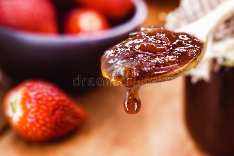 Drop of Jam Dripping from the Spoon. Brazil Grape Jelly, Called ...