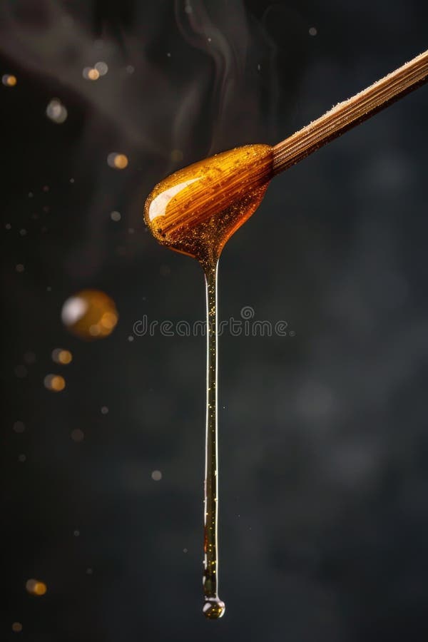 A Wooden Spoon with Liquid Drips Down Its Surface, Perfect for ...