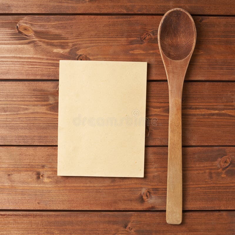 Wooden Spoon Next To Recipe Book Stock Photo - Image of food ...