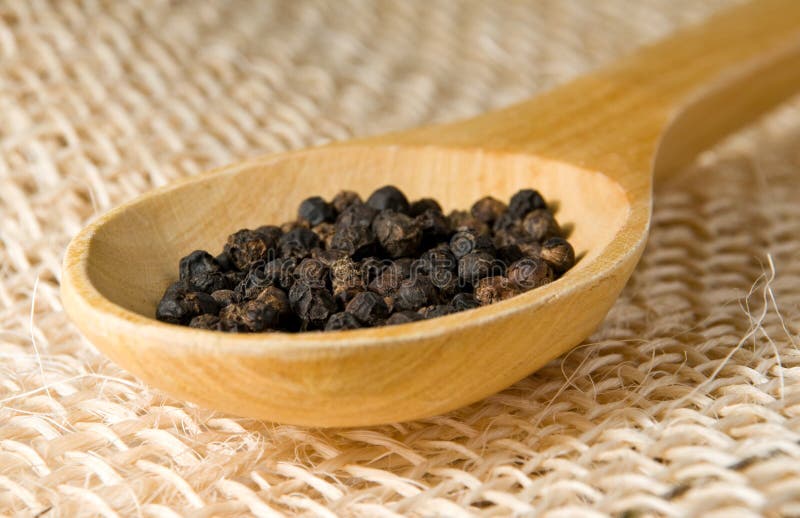 Black Pepper on Wooden Spoon Stock Image - Image of wood, wooden: 56709617