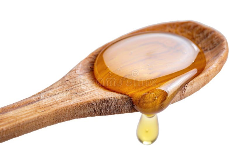 A Wooden Spoon with a Single Drop of Oil Stock Image - Image of utensil ...