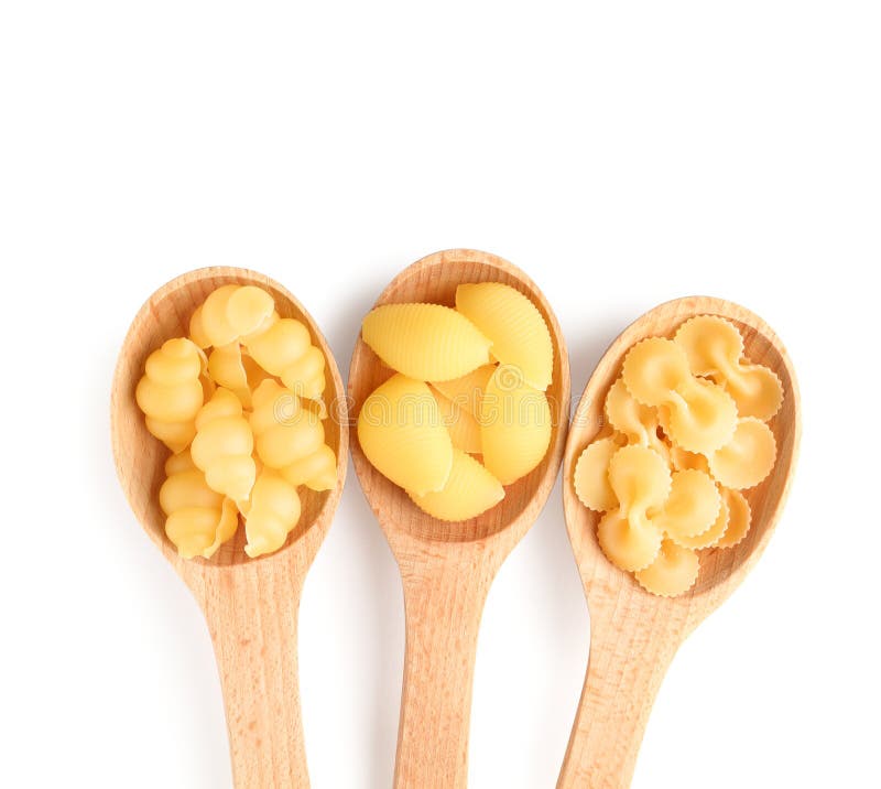 Wooden Spoons with Different Types of Pasta on White Background Stock ... Wooden Spoons with Different Types of Pasta on White Background Stock ...