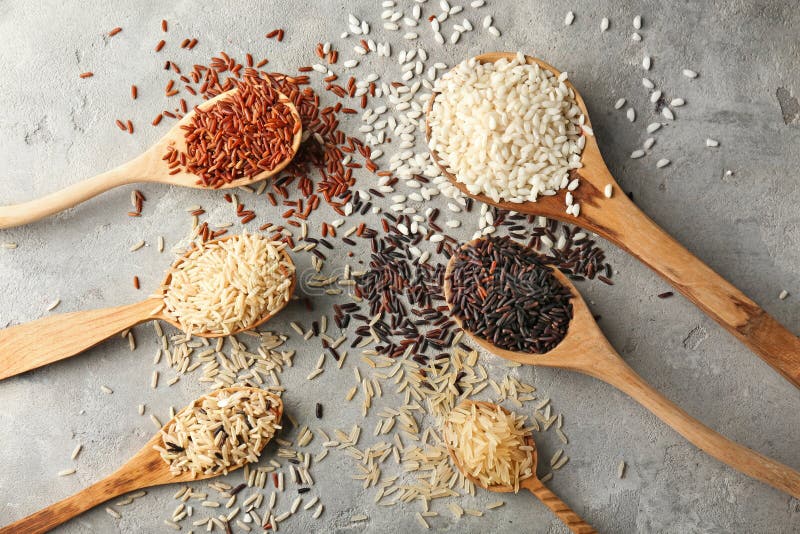 Wooden Spoons with Different Types of Rice on Table, Top View Stock ... Wooden Spoons with Different Types of Rice on Table, Top View Stock ...