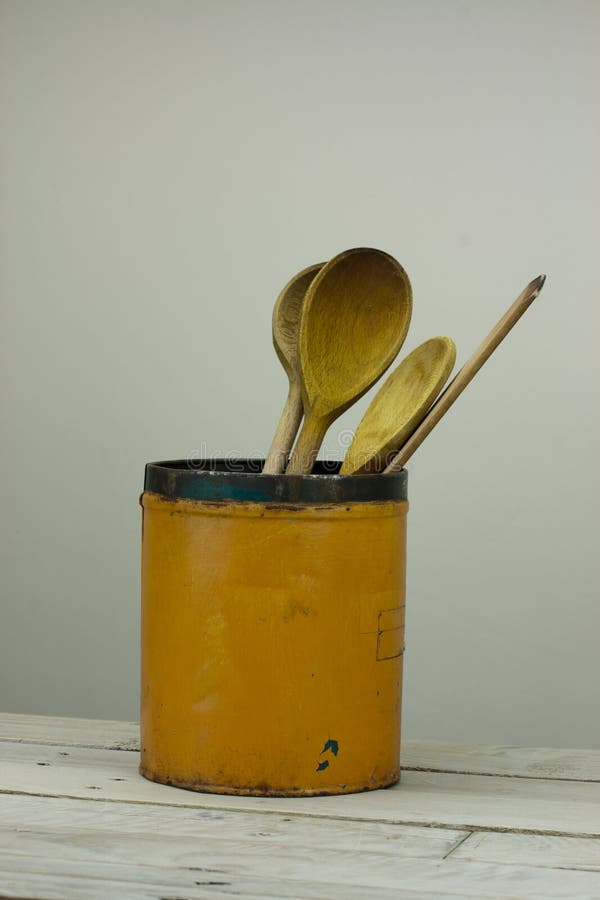 Wooden spoons in a tin stock photo. Image of utensil - 56433870