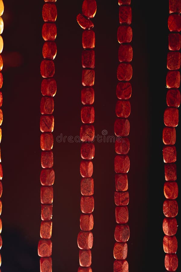 Wooden Square Beads Strung on a String, Vertical String Beads Stock ...