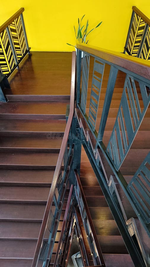 A Wooden Staircase Forming a Triangular Perspective Stock Photo - Image ...