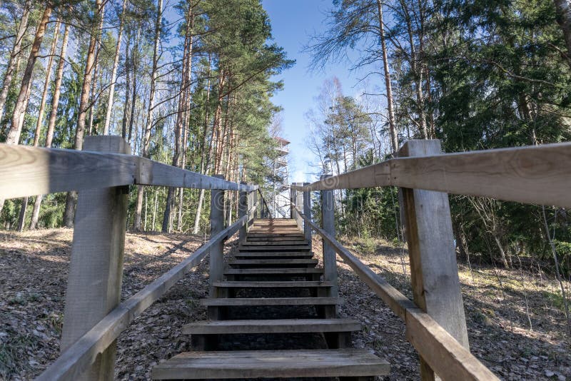A Wooden Staircase with a Handrail on a Small Hill Path Stock Photo ...