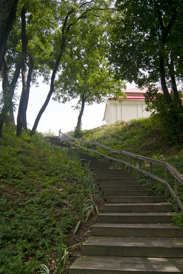 Wooden stairs up the hill stock image. Image of nature - 65337201