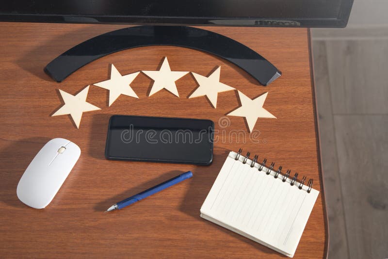 Wooden 5 Stars on the Workplace. Customer Satisfaction Stock Image ...