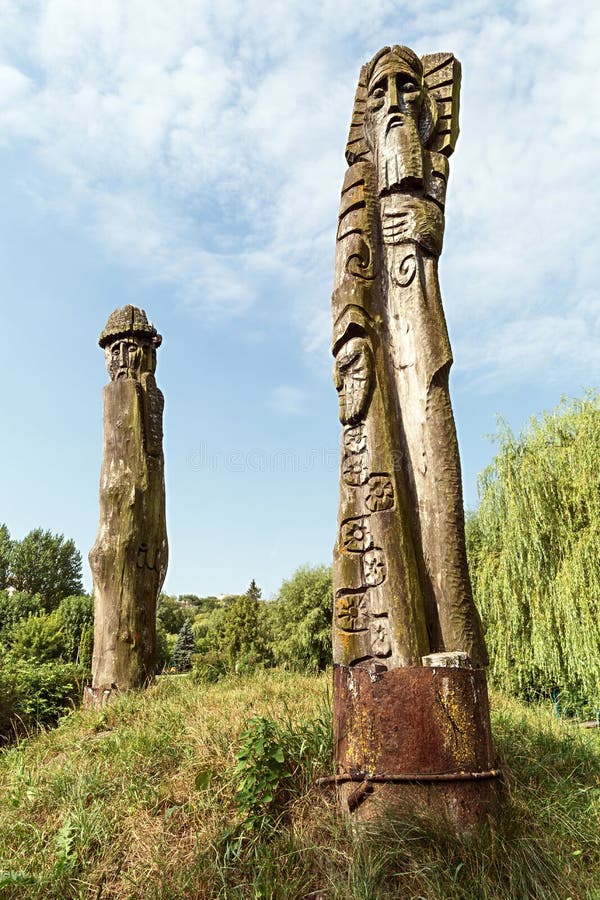 Wooden statues stock image. Image of wooden, grass, trees - 62348563