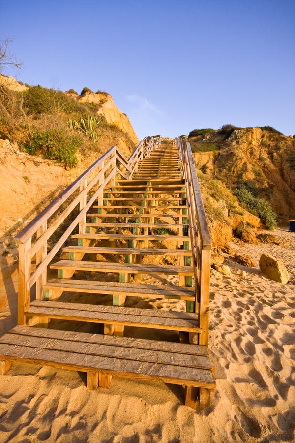 Wooden steps to the beach stock image. Image of sand - 10431867