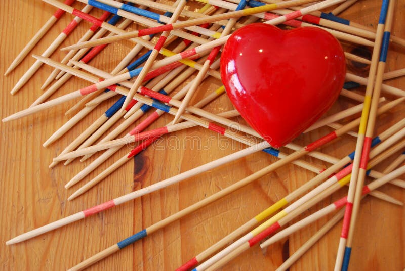 Wooden Stick Game with a Red Heart on a Wood Table Stock Photo - Image ...