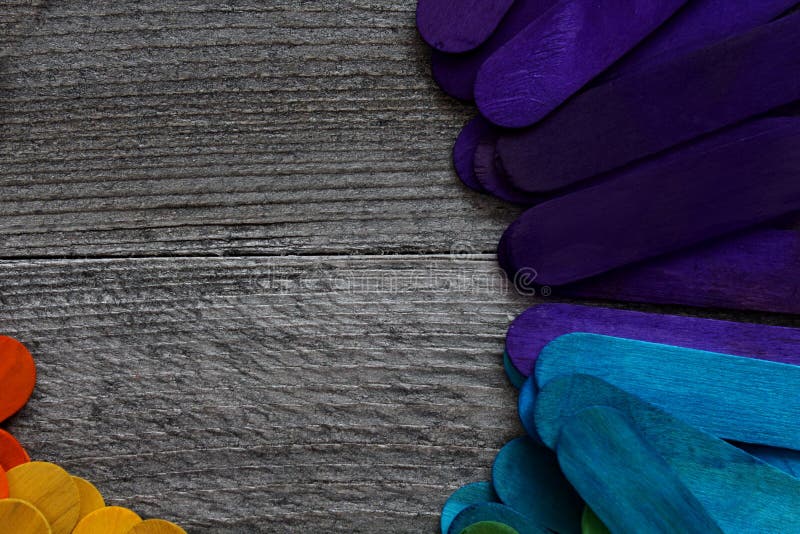 Wooden Sticks Painted in Different Colors on a Wooden Table Stock Photo ...