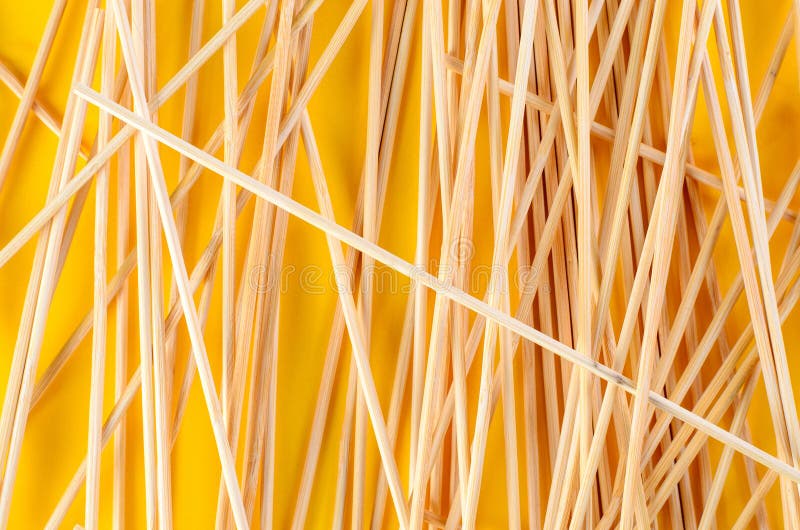 Wooden Sticks on Yellow Background Creative Natural Texture Stock Image ...