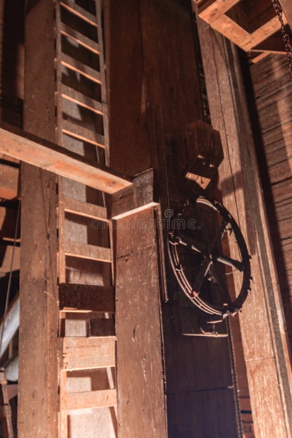 A Wooden Structure with a Wooden Ladder and a Wooden Wheel Stock Photo ...