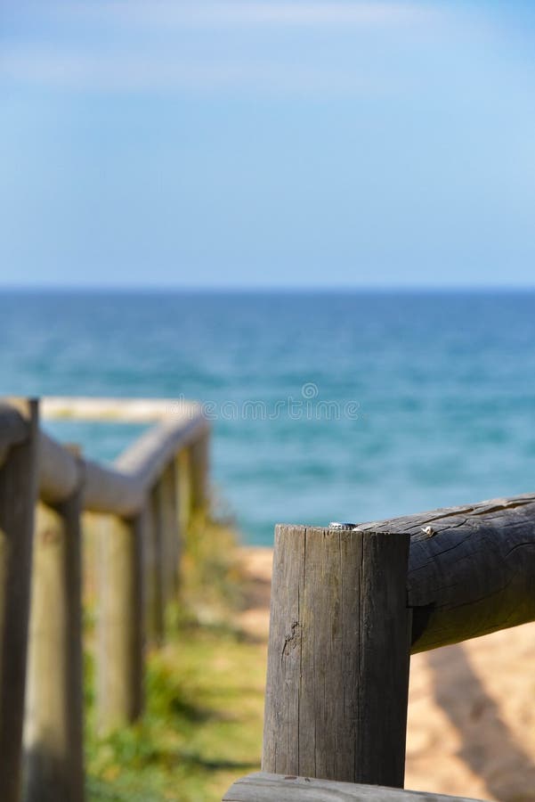 Wooden Structures at the Beach Stock Photo - Image of bright, footpath ...