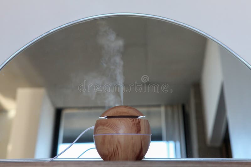 Aromatherapy Diffuser on Table with Warm Sunlight in Cozy Room, AI ...