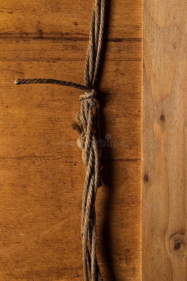 Wooden Surface and Old Rope Stock Photo - Image of sign, knot: 38103978