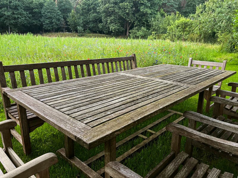 Wooden Table with Bench and Chairs in Garden. Landscape Design Stock ...