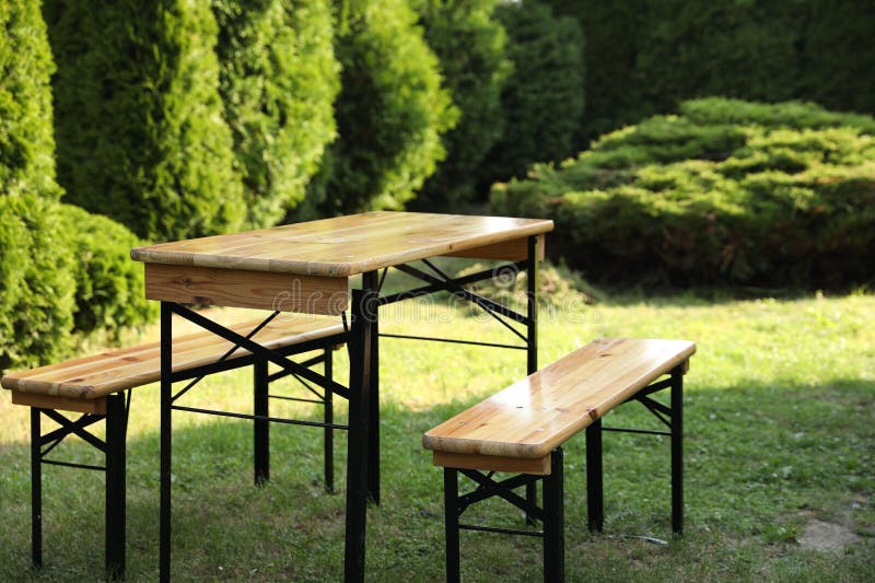 Wooden Table with Benches in Garden on Sunny Day Stock Image - Image of ...
