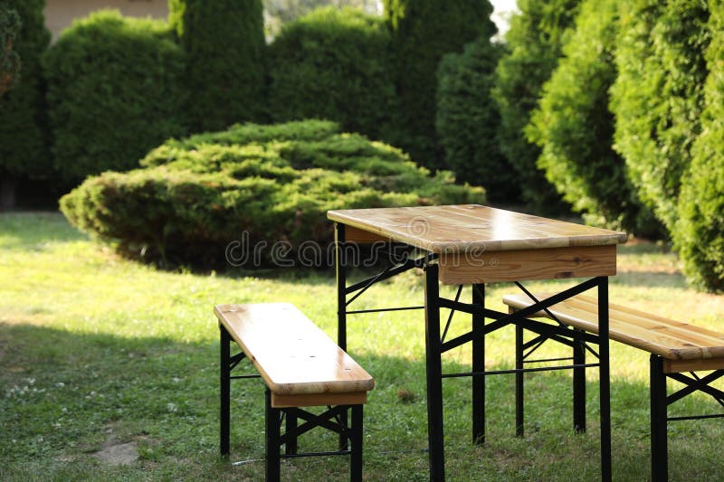 Wooden Table with Benches in Garden on Sunny Day Stock Photo - Image of ...