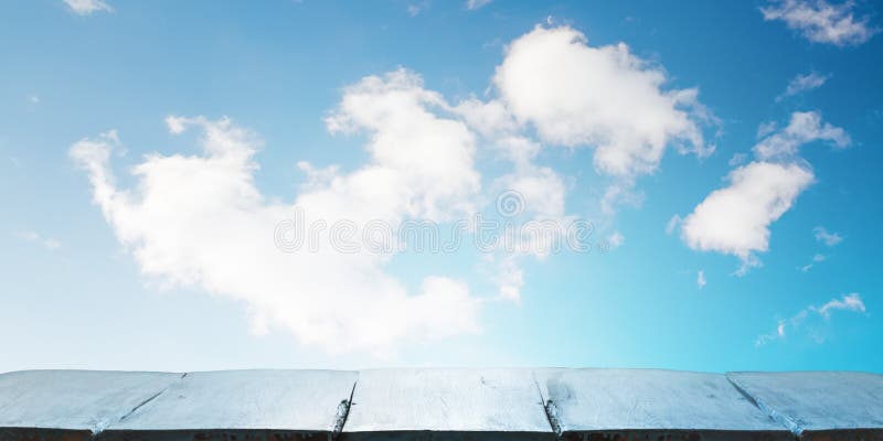 Wooden table, blue sky stock photo. Image of design - 271342098