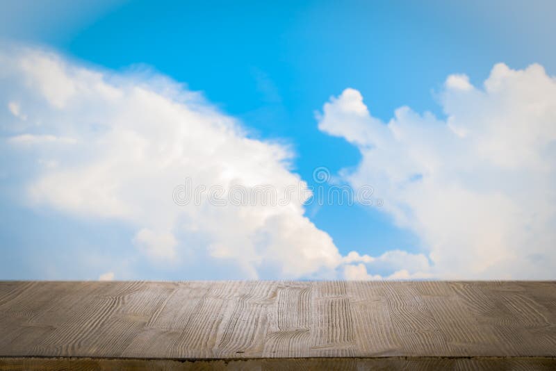 Wooden table, blue sky stock image. Image of design - 268632875