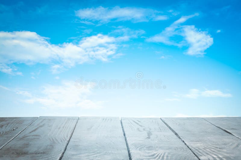 Wooden table, blue sky stock photo. Image of design - 271342098