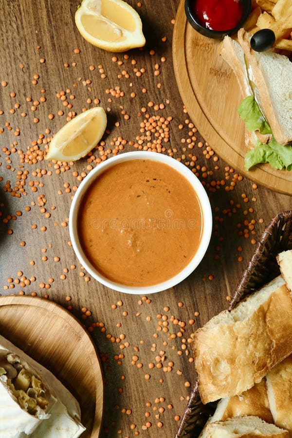 Wooden Table with Bread and Bowl of Dip Stock Photo - Image of fresh ...