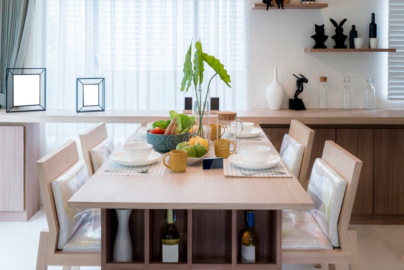Wooden Table and Chair in Modern Dinning Room at Home. Interior Stock ...