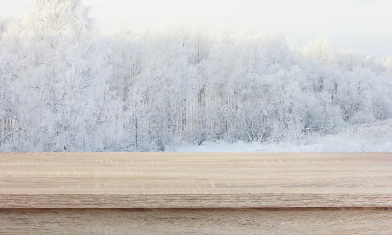 Wooden Table with Cutting Board on Blurred Winter Background Stock ...