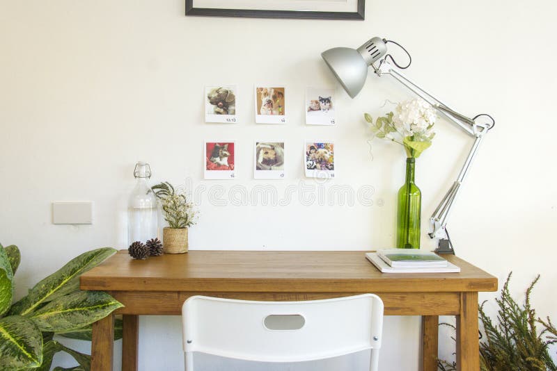 Wooden Table and Decorative Elements in White Room Stock Image - Image ...